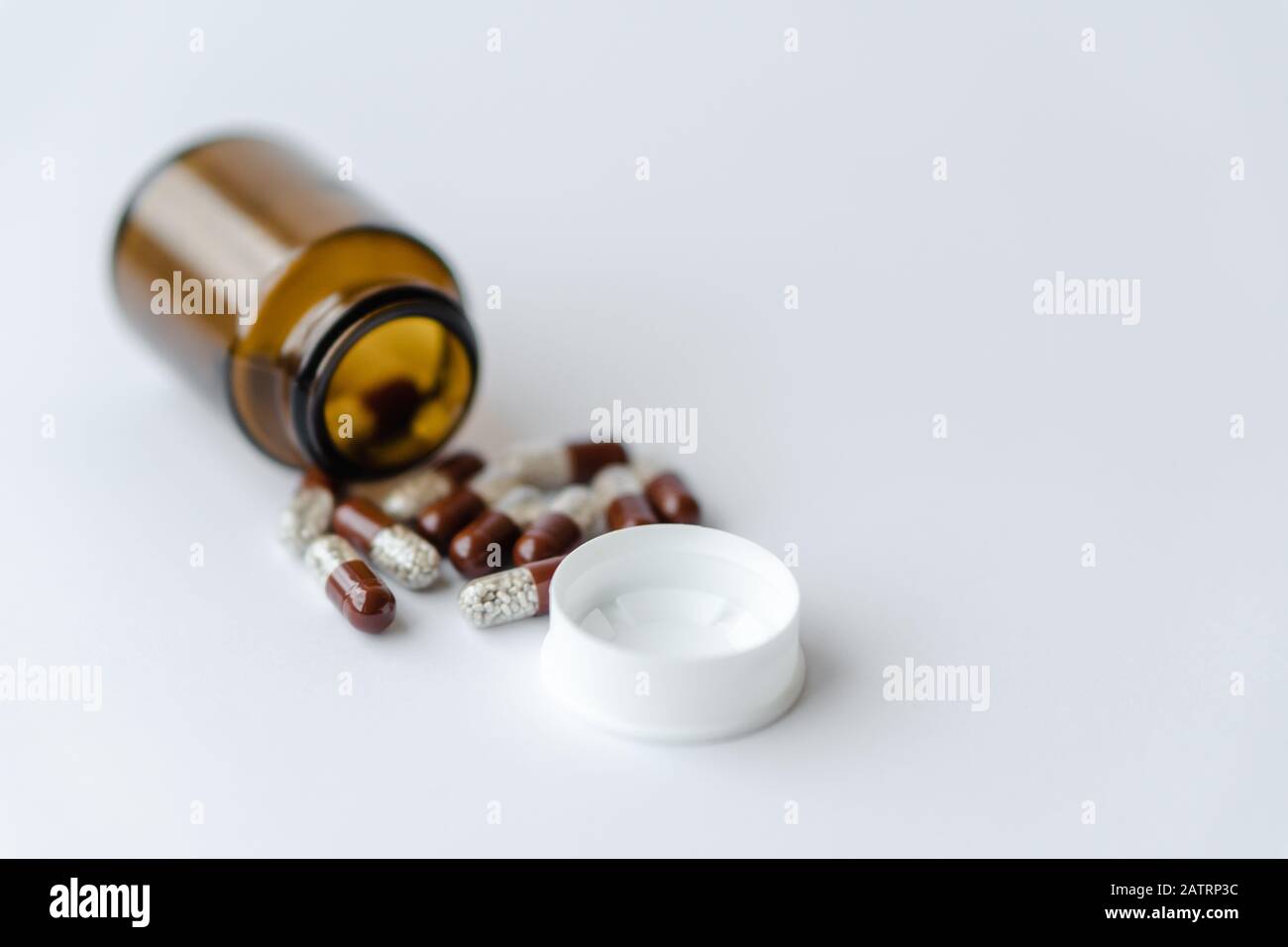 Medicine and pills. Medicines on a white background close-up. Brown ...