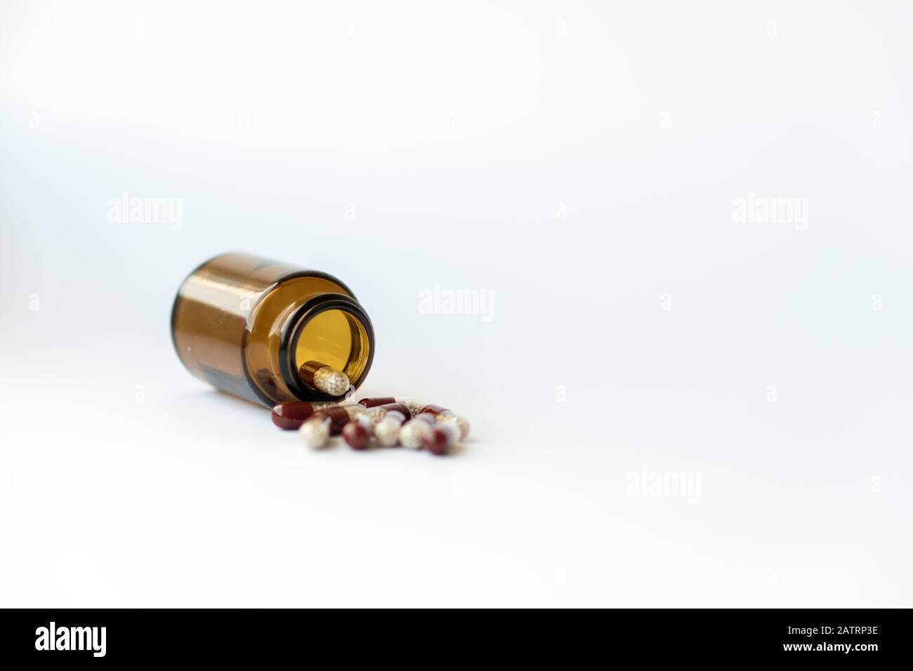 Medicine and pills. Medicines on a white background close-up. Brown ...