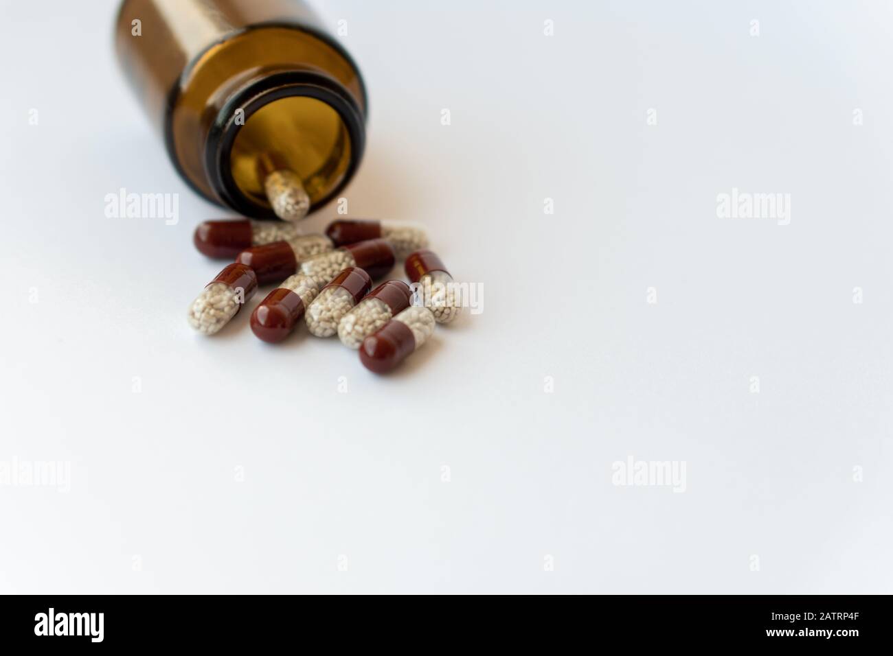 Medicine and pills. Medicines on a white background close-up. Brown ...