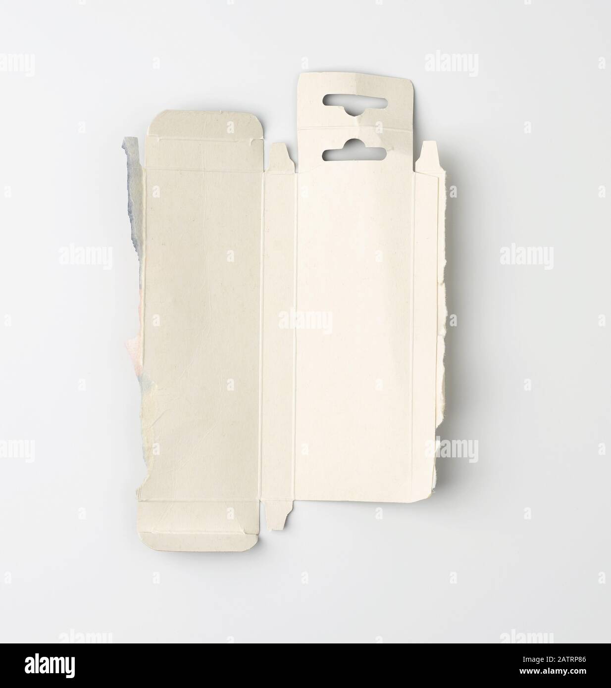 torn and unfolded cardboard box on a white background, close up Stock ...