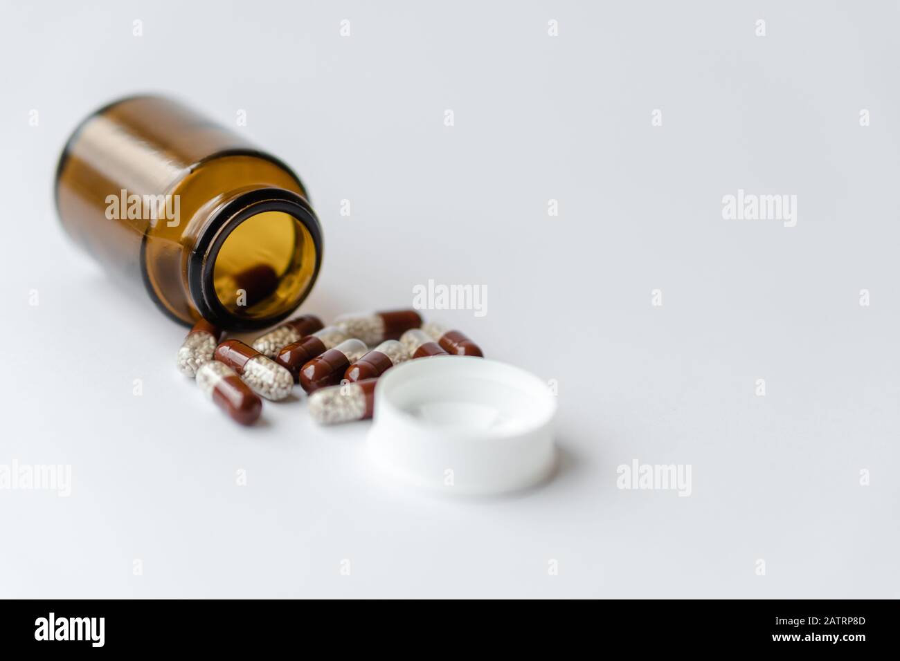 Medicine and pills. Medicines on a white background close-up. Brown ...