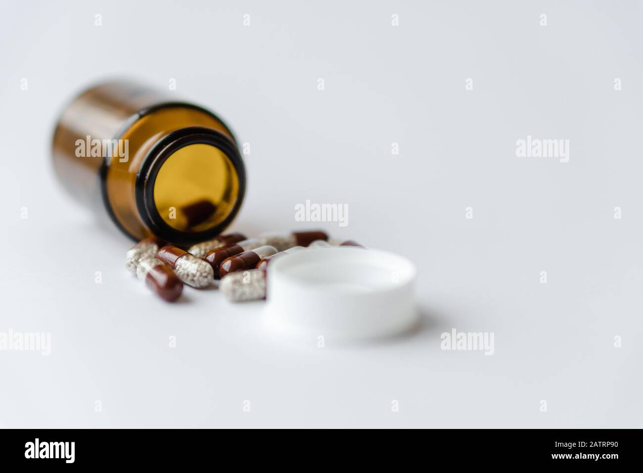 Medicine and pills. Medicines on a white background close-up. Brown ...