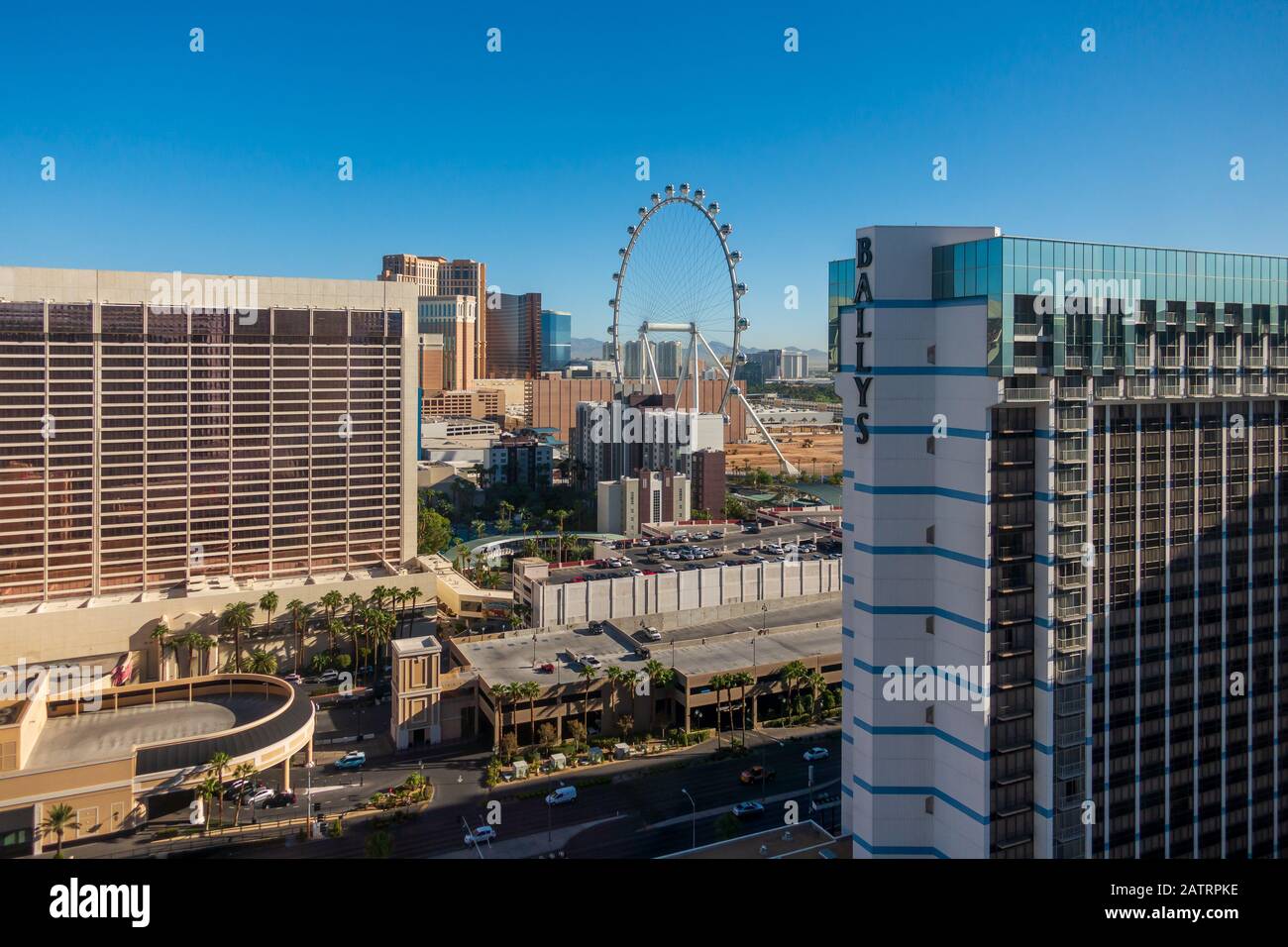 Ferris wheel and high rise buildings in modern city Stock Photo - Alamy