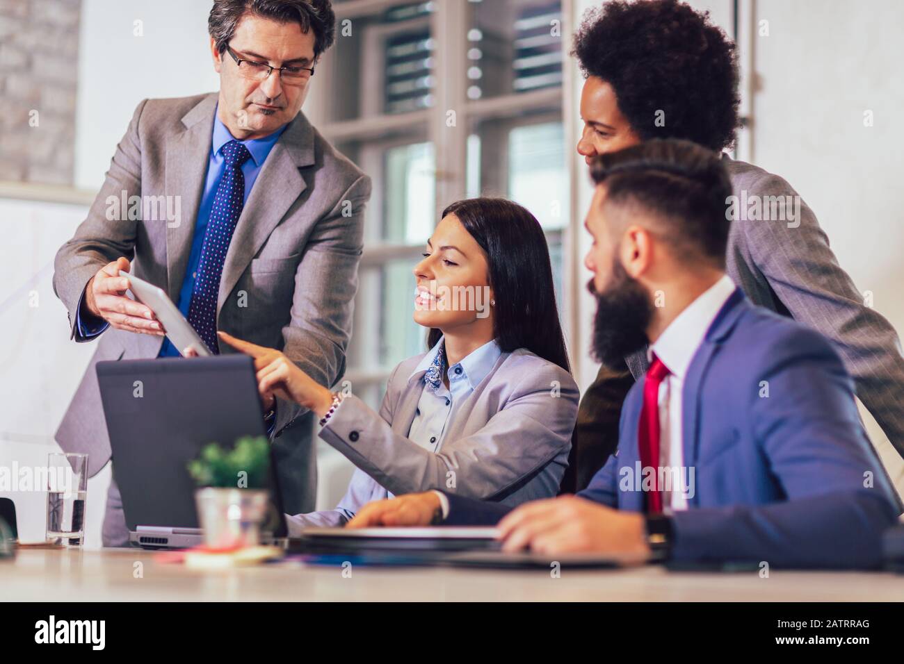 Group architects sitting around table hi-res stock photography and ...