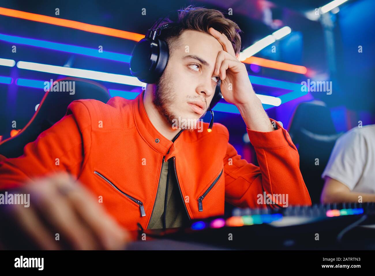 Streamer young man professional video gamer regrets loser playing ...