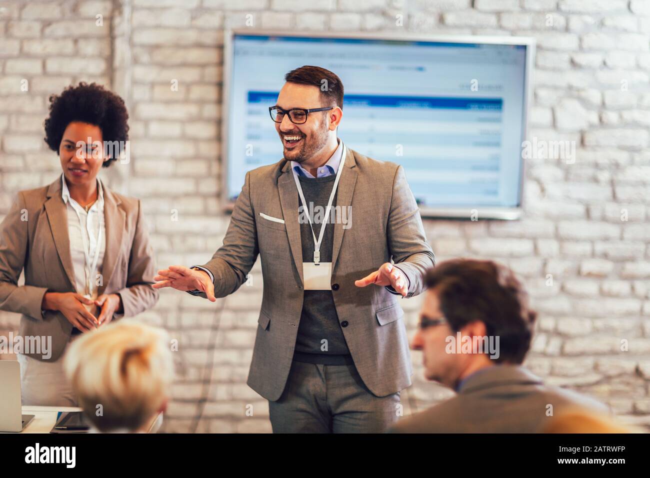 Speaker giving a talk in conference hall at business event Stock Photo ...