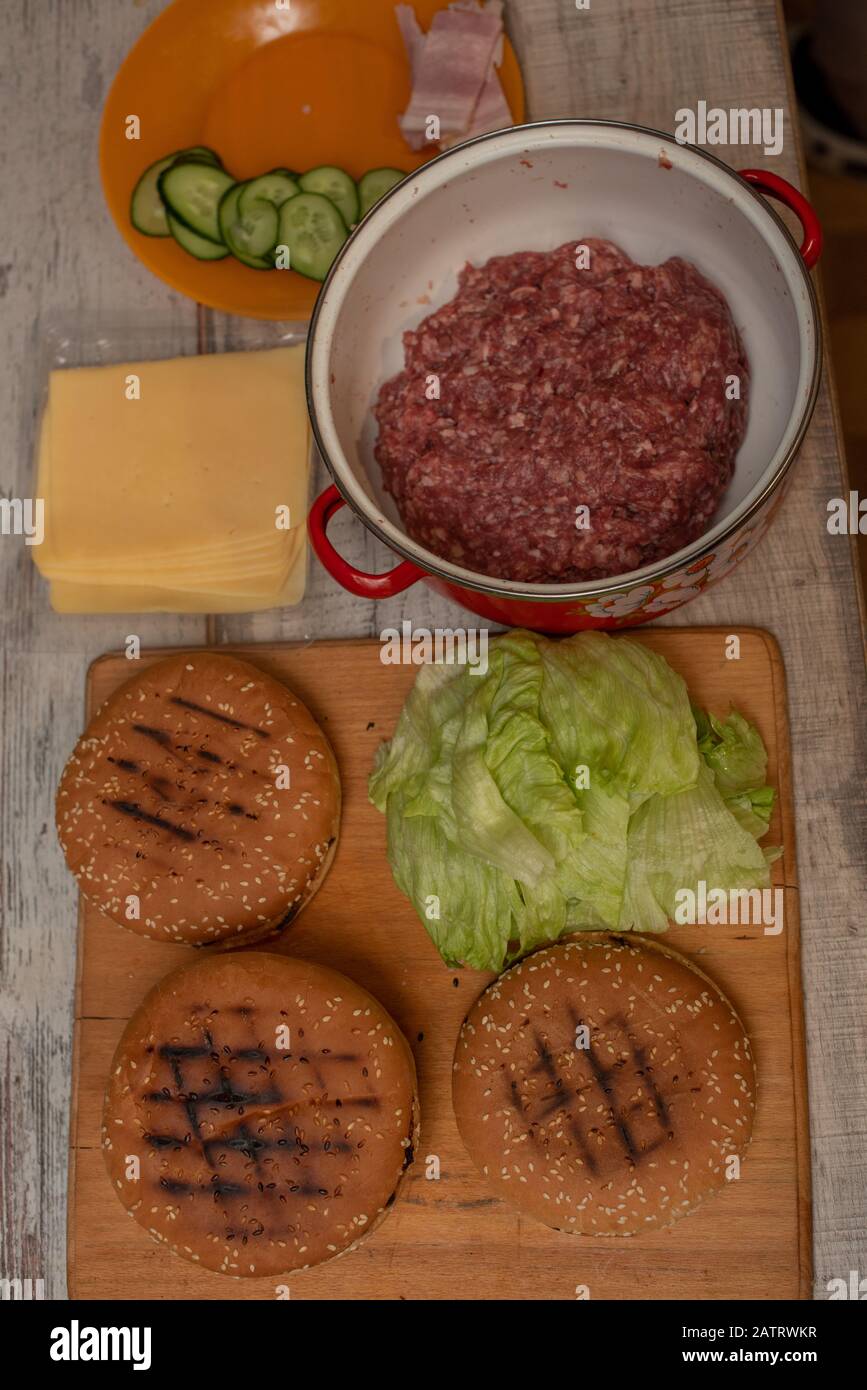 cooking hamburgers, making a hamburger, pictures with buns, raw meat ...