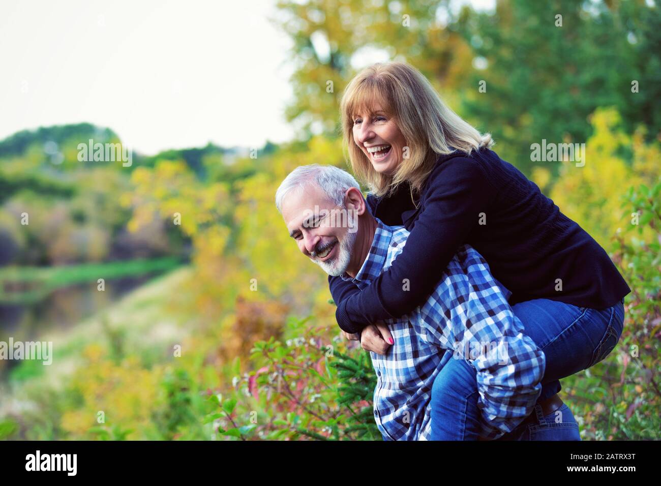 Piggy back ride hi-res stock photography and images - Alamy