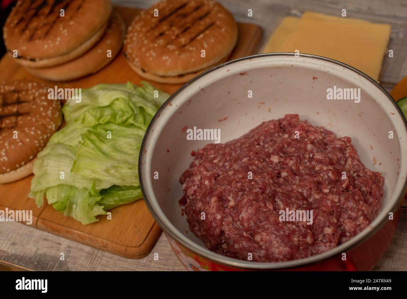 cooking hamburgers, making a hamburger, pictures with buns, raw meat ...