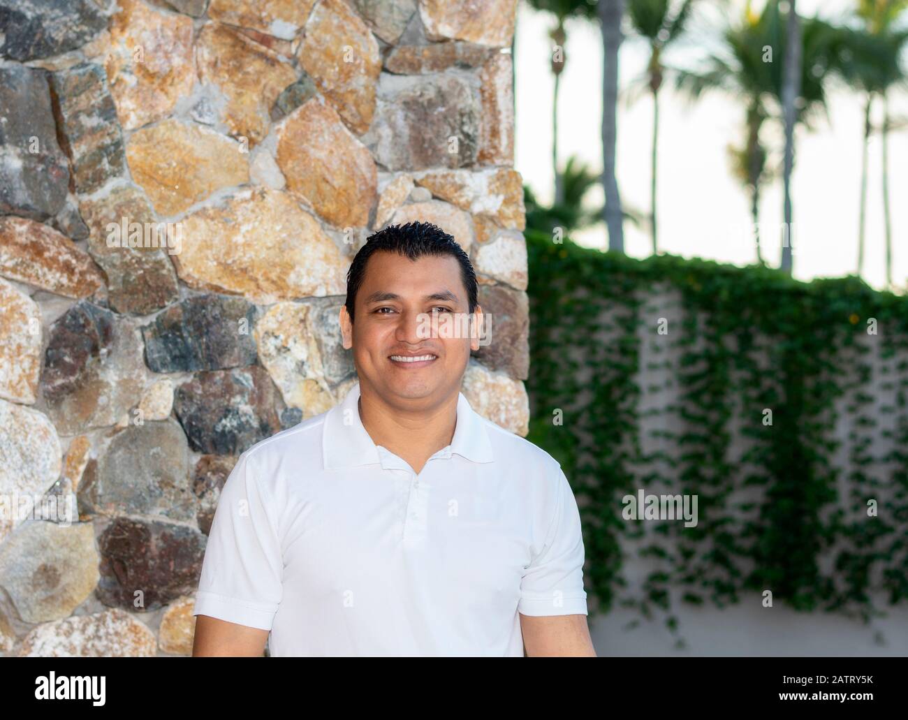 Happy, Smiling, Friendly & Handsome Mexican Man Working in a Resort ...