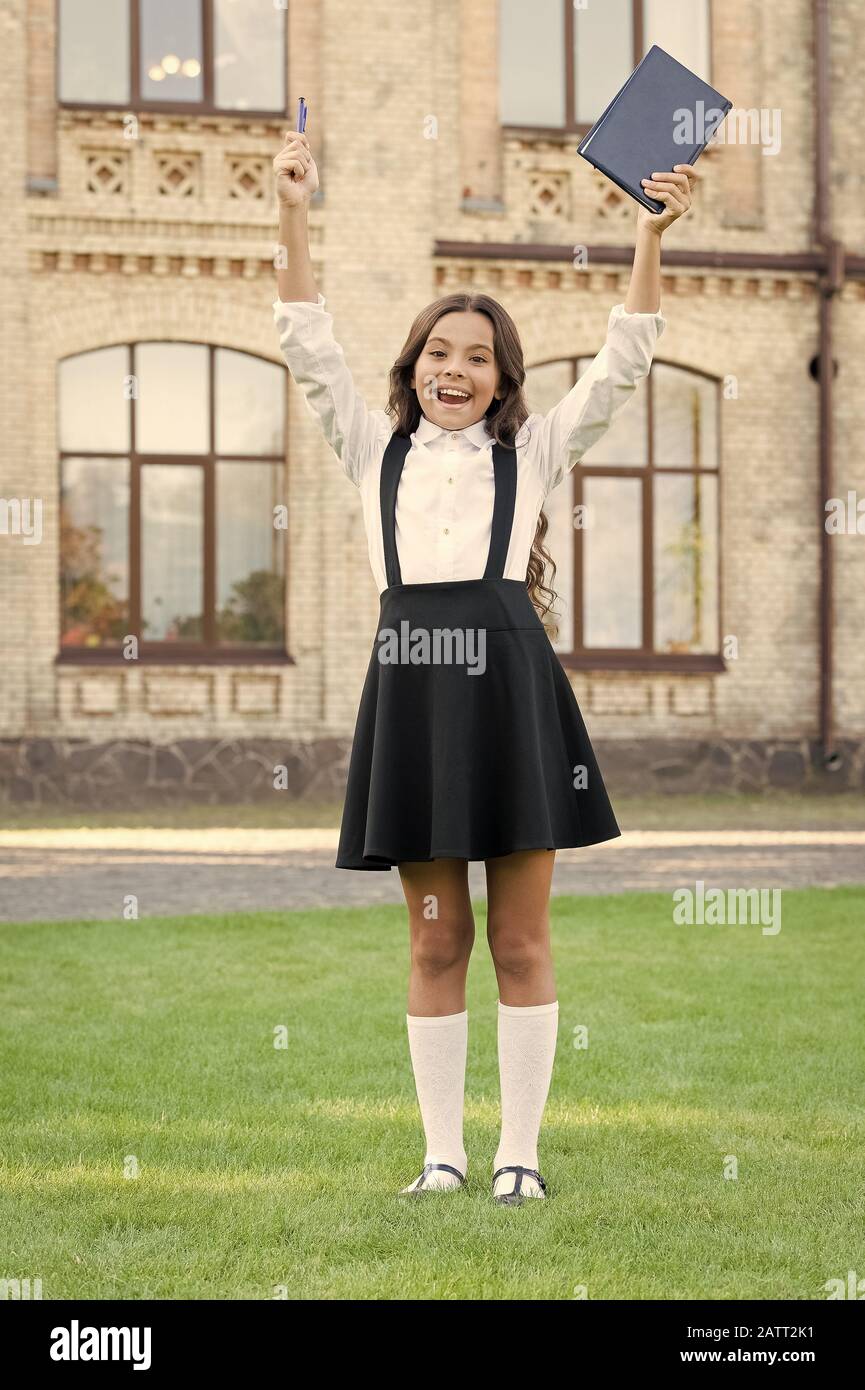 Hurray for school holidays. Happy child finish primary school. Cute ...