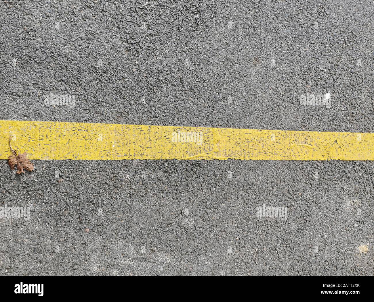 Texture of macadam asphalt with yellow line painted for design ...