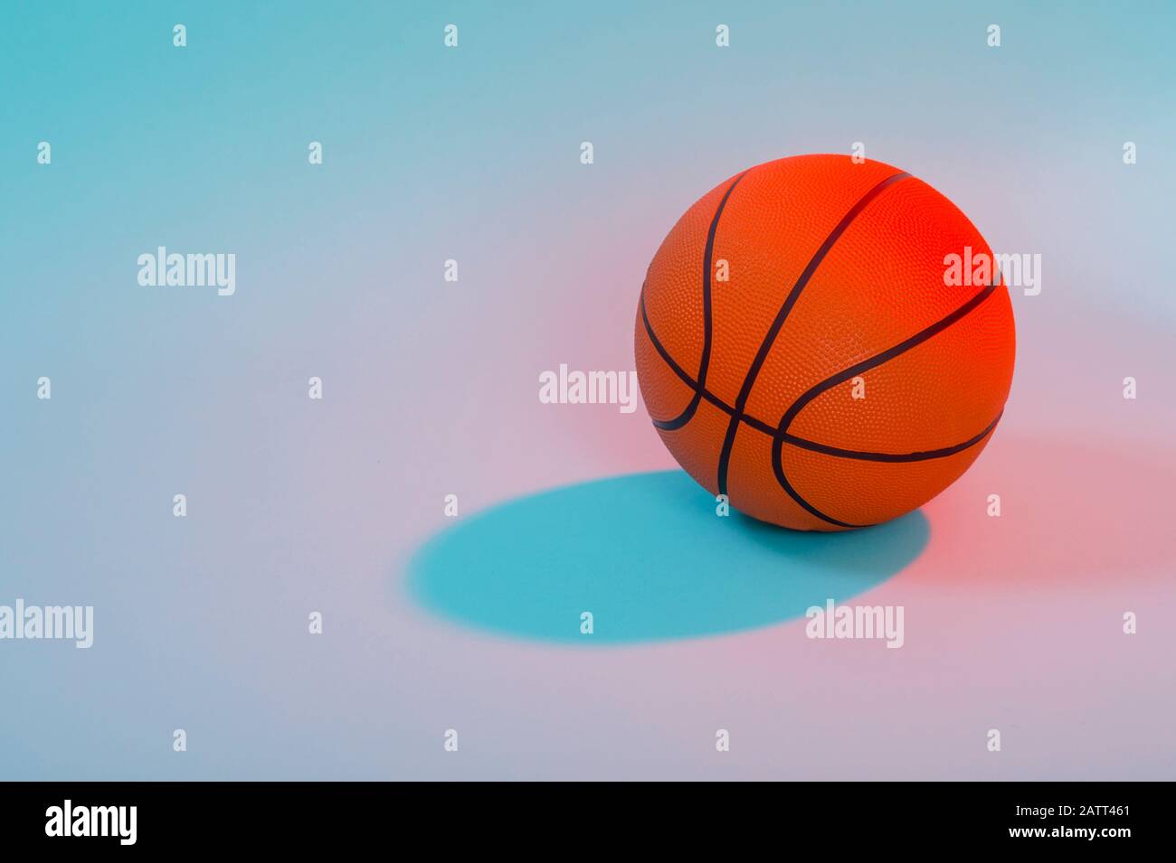 Basketball ball isolated on blue background. Blue neon Banner Art ...