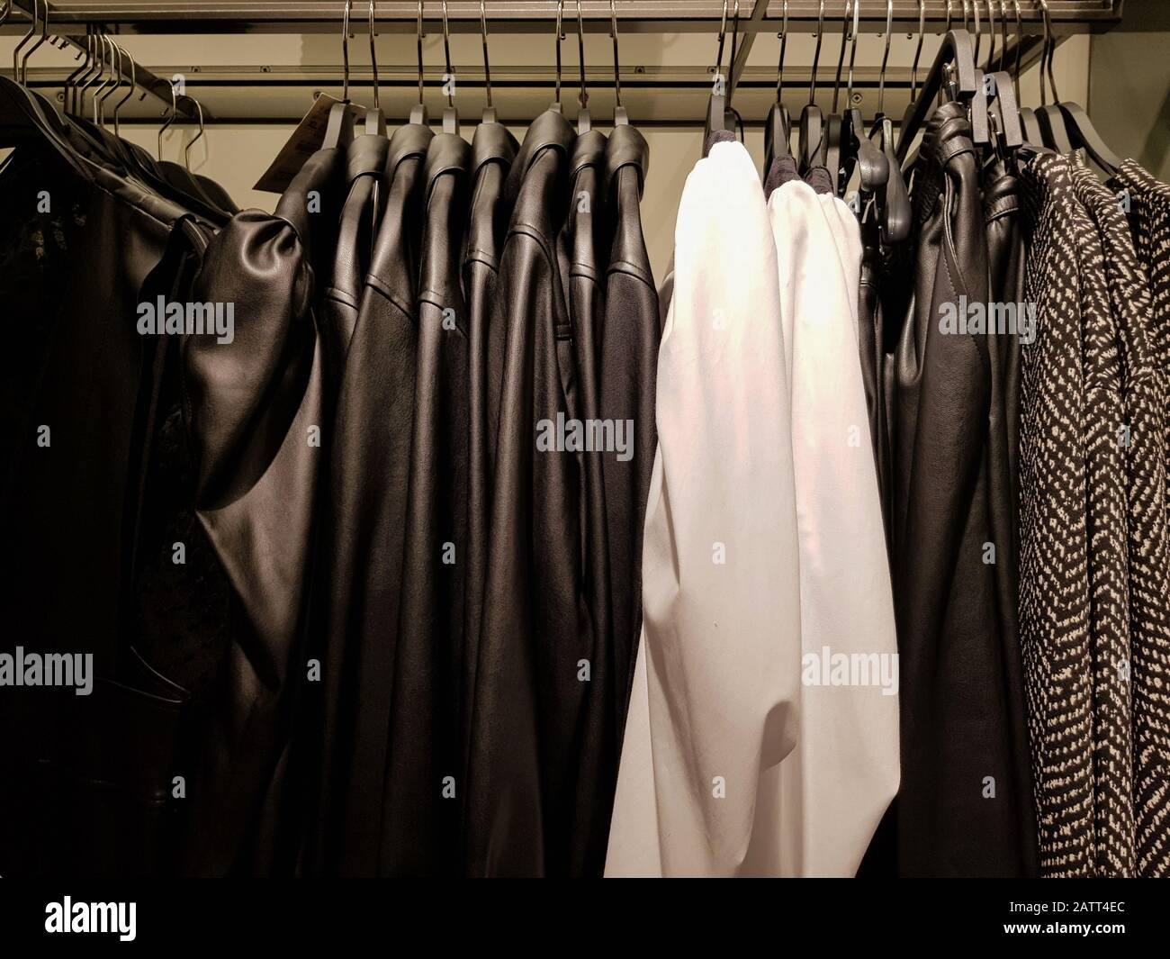 Fashionable clothes in a boutique store Stock Photo - Alamy