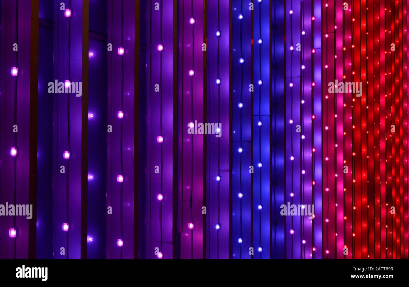 Red, blue and purple lighting on a building near Han Street, Wuchang ...