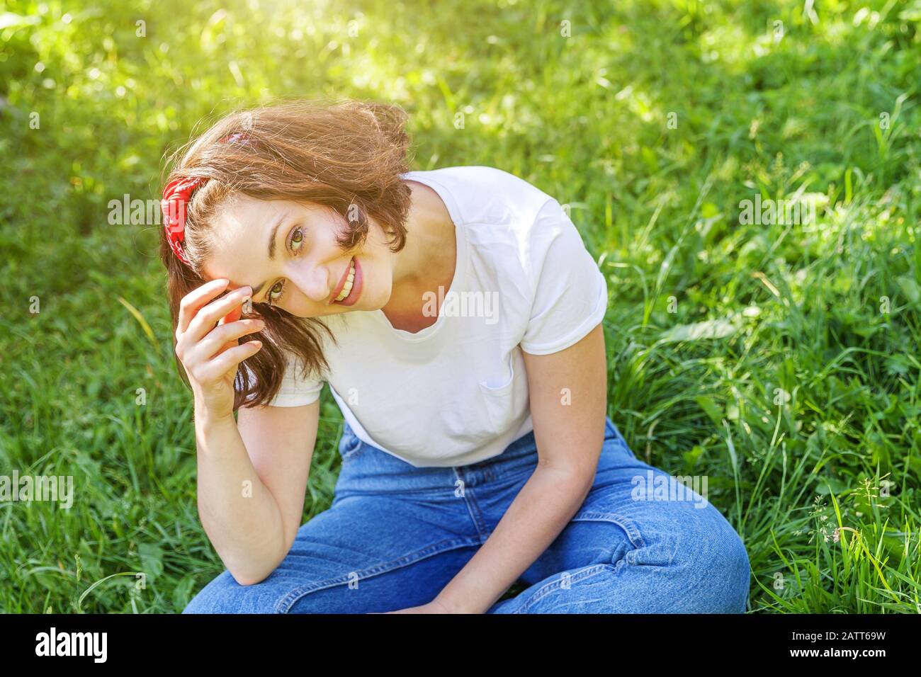 Happy girl smiling outdoor. Beautiful young brunete woman with brown ...