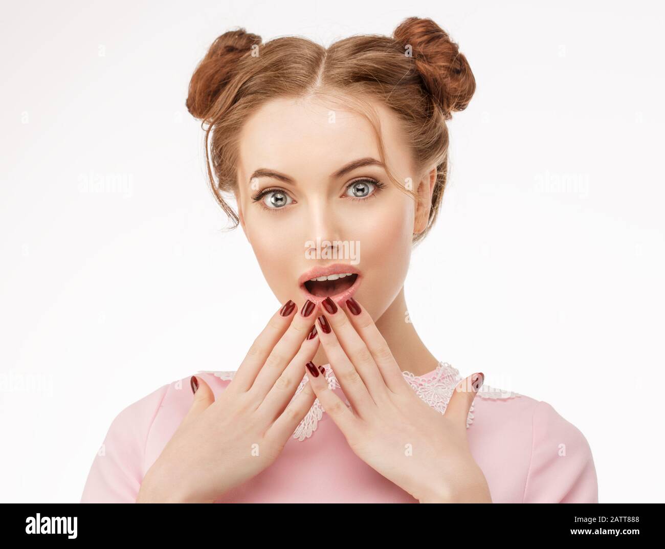 Excited woman surprise holds cheeks by hand. Looking camera. Expressive ...