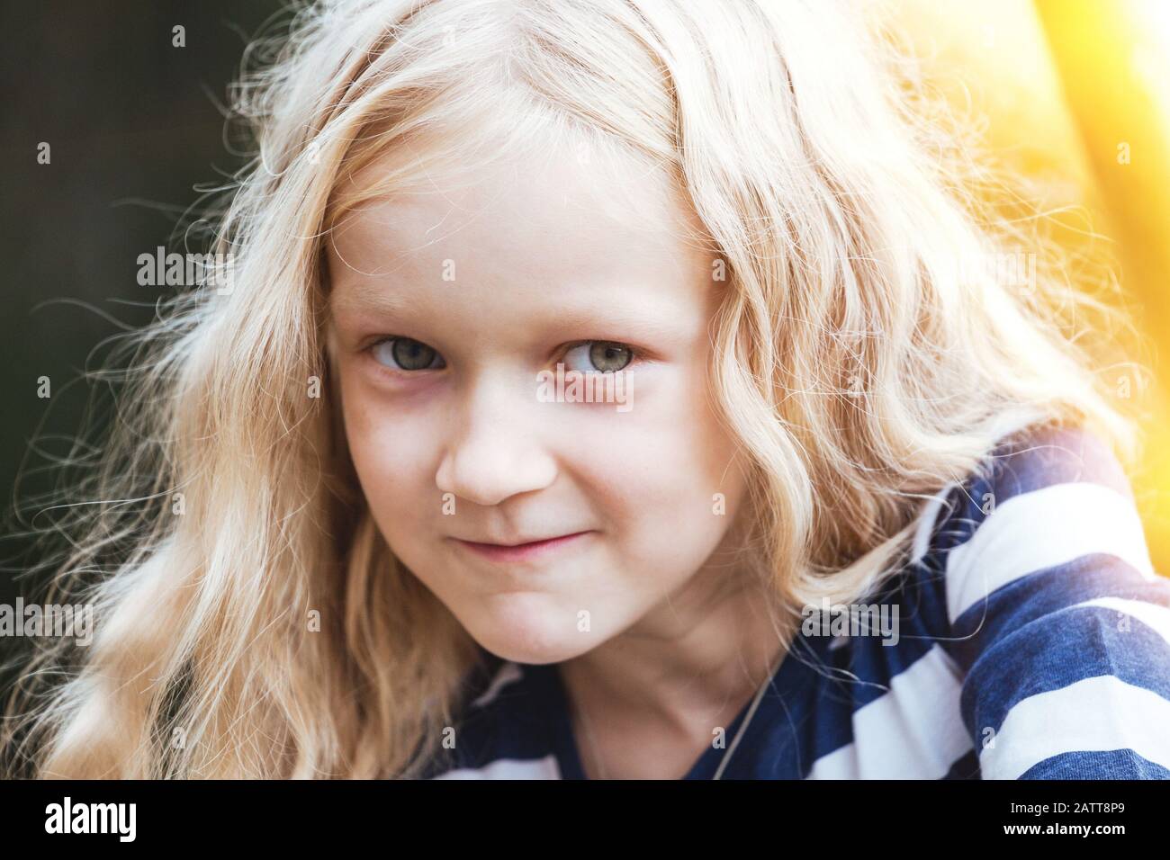 Portrait of a smiling beautiful little blonde girl Stock Photo - Alamy