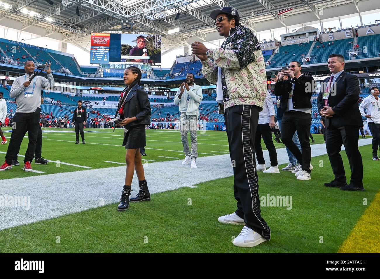 Jay-Z and Blue Ivy Carter throw a football on the field before Super ...
