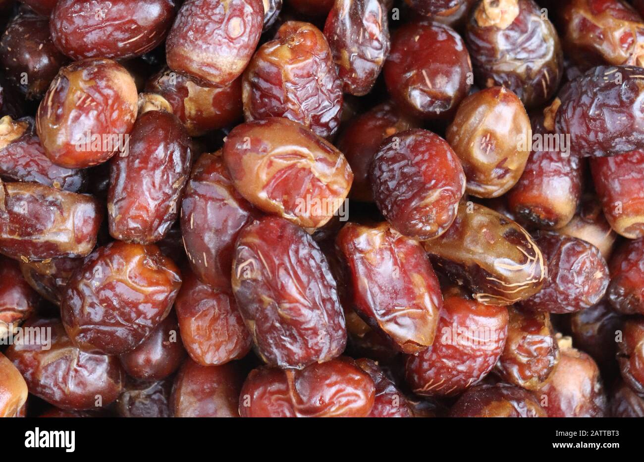 Dates fruits backgrounds. Pile of dates fruits in a shop Stock Photo ...