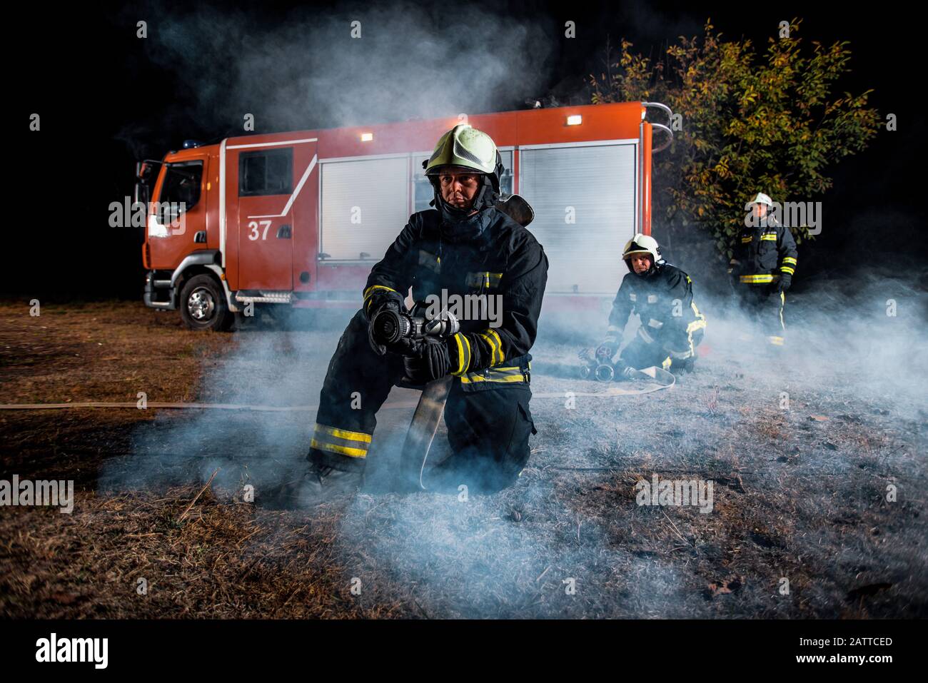 Fire department in the field during a fire emergency situation Stock ...