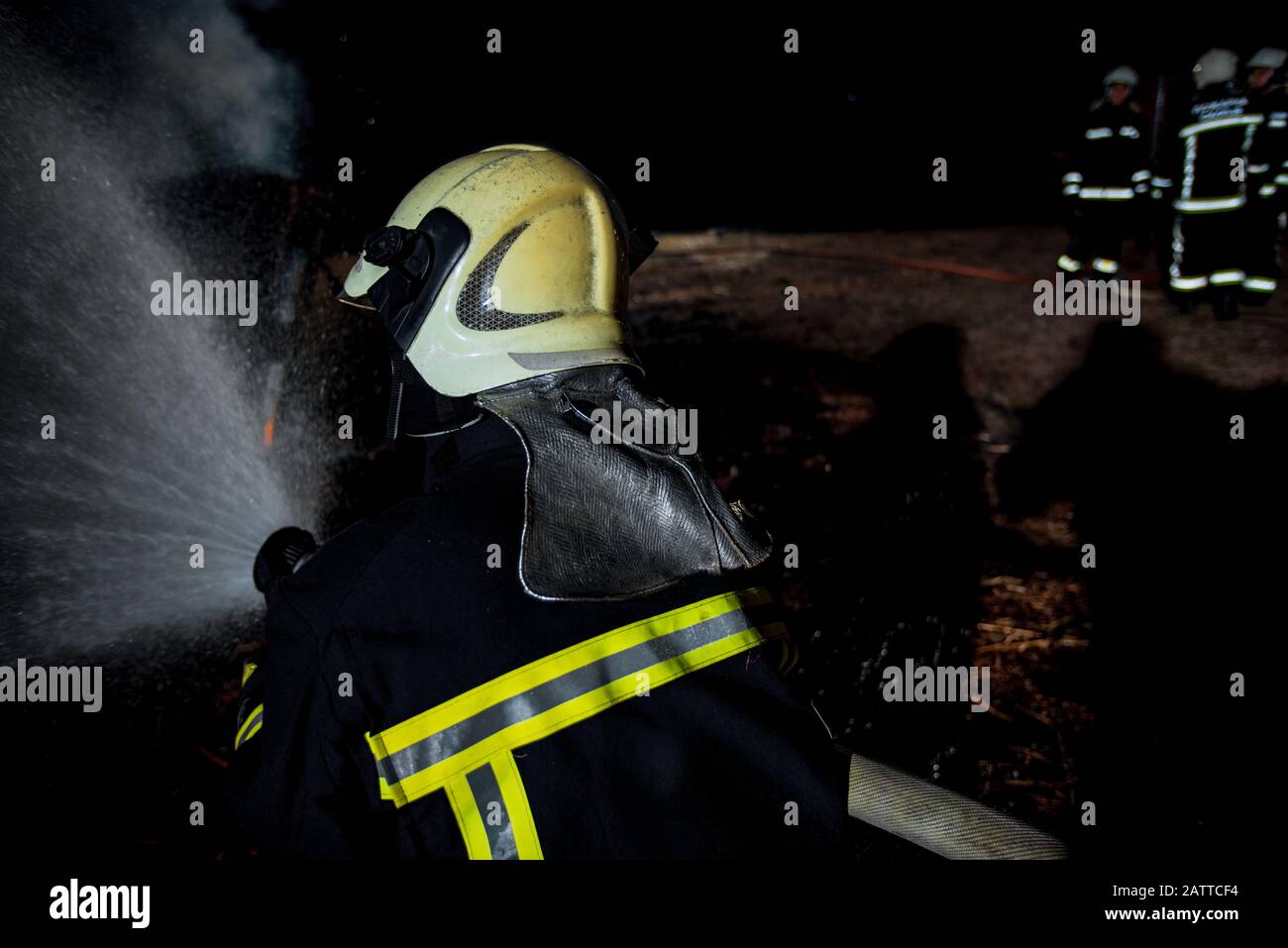 Fire station crew during an urgent operation at night time Stock Photo ...
