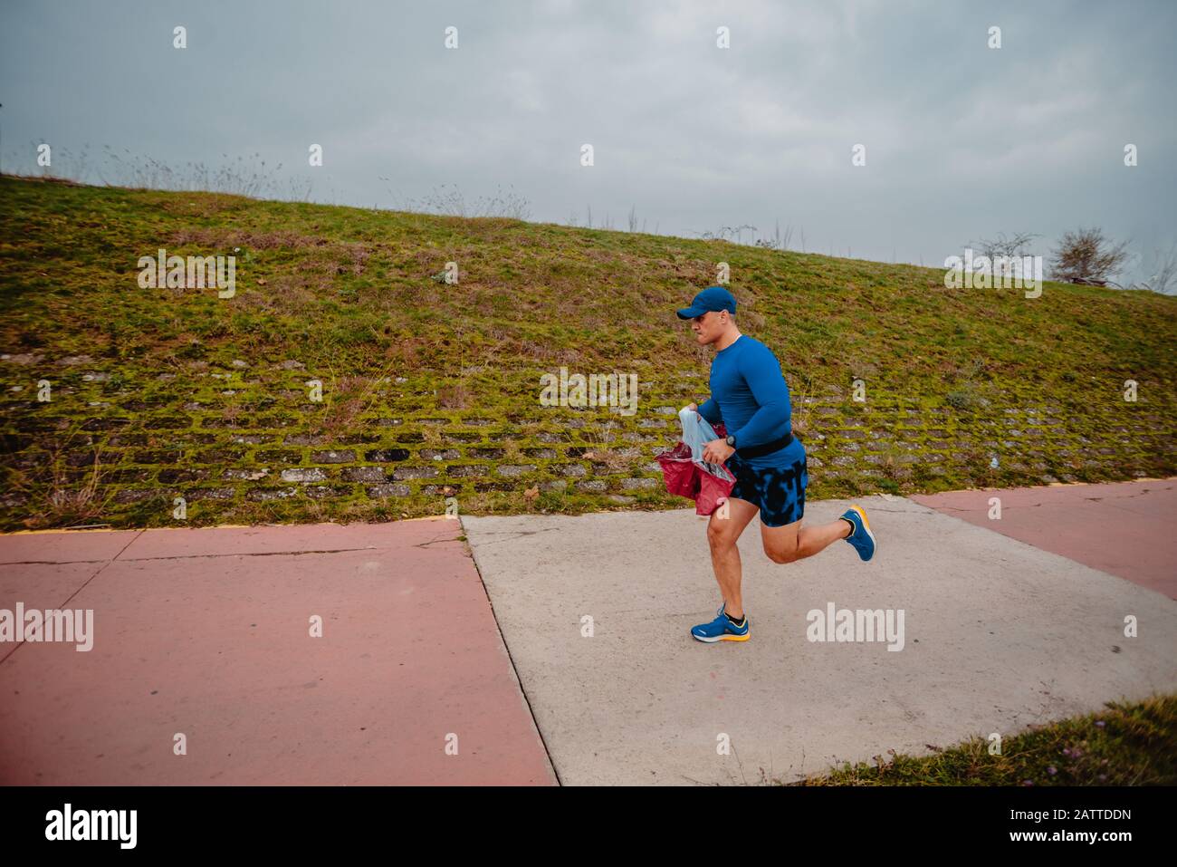 Male runner fields hi-res stock photography and images - Alamy