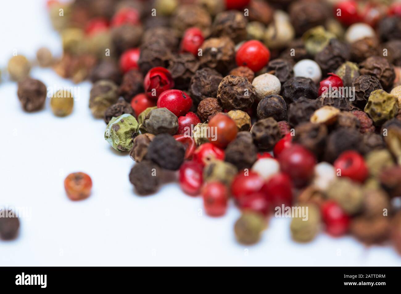 herbs and spices. heap fragrant peppers mix on a white background Stock ...