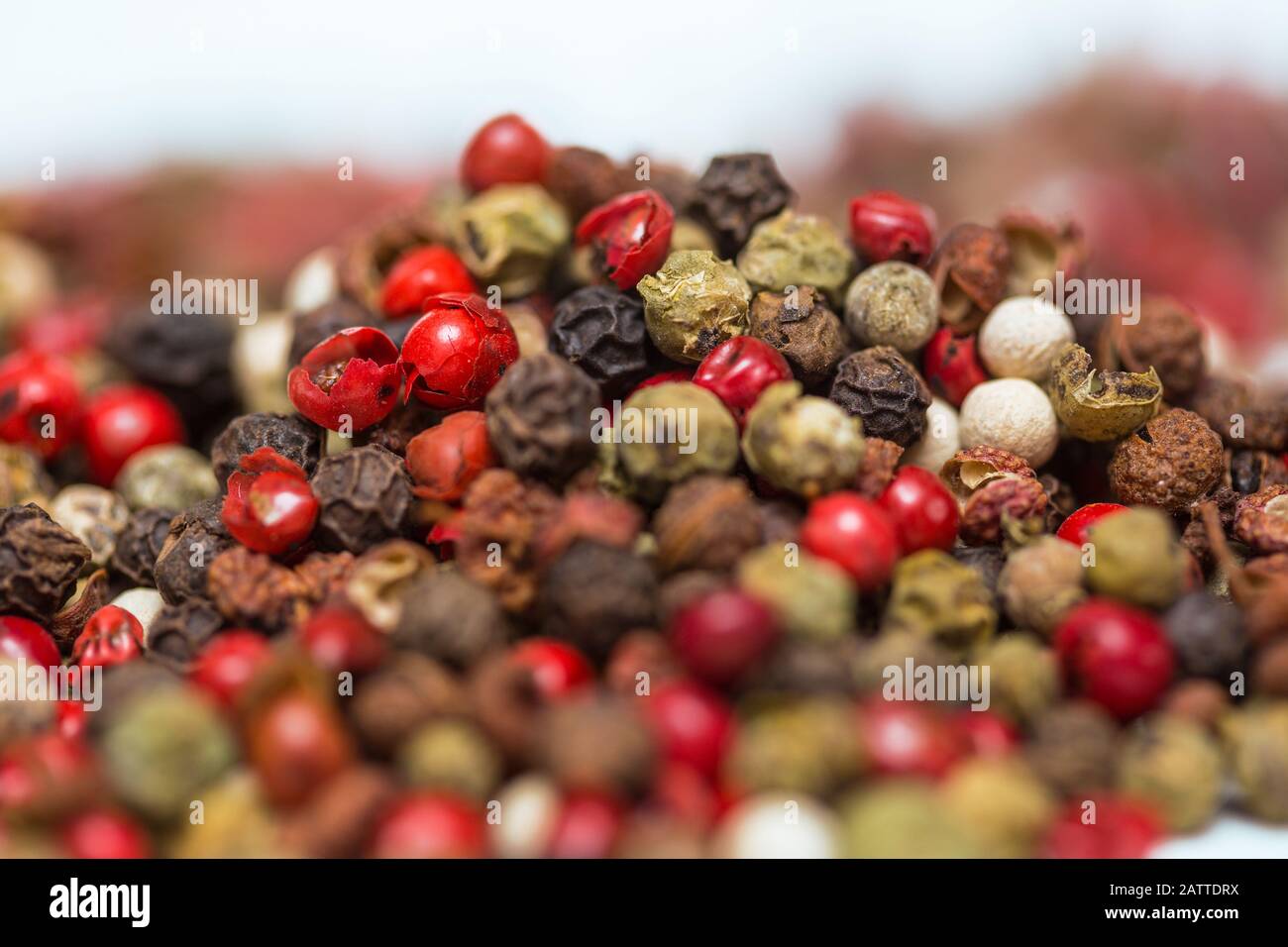 herbs and spices. heap fragrant peppers mix on a white background Stock ...