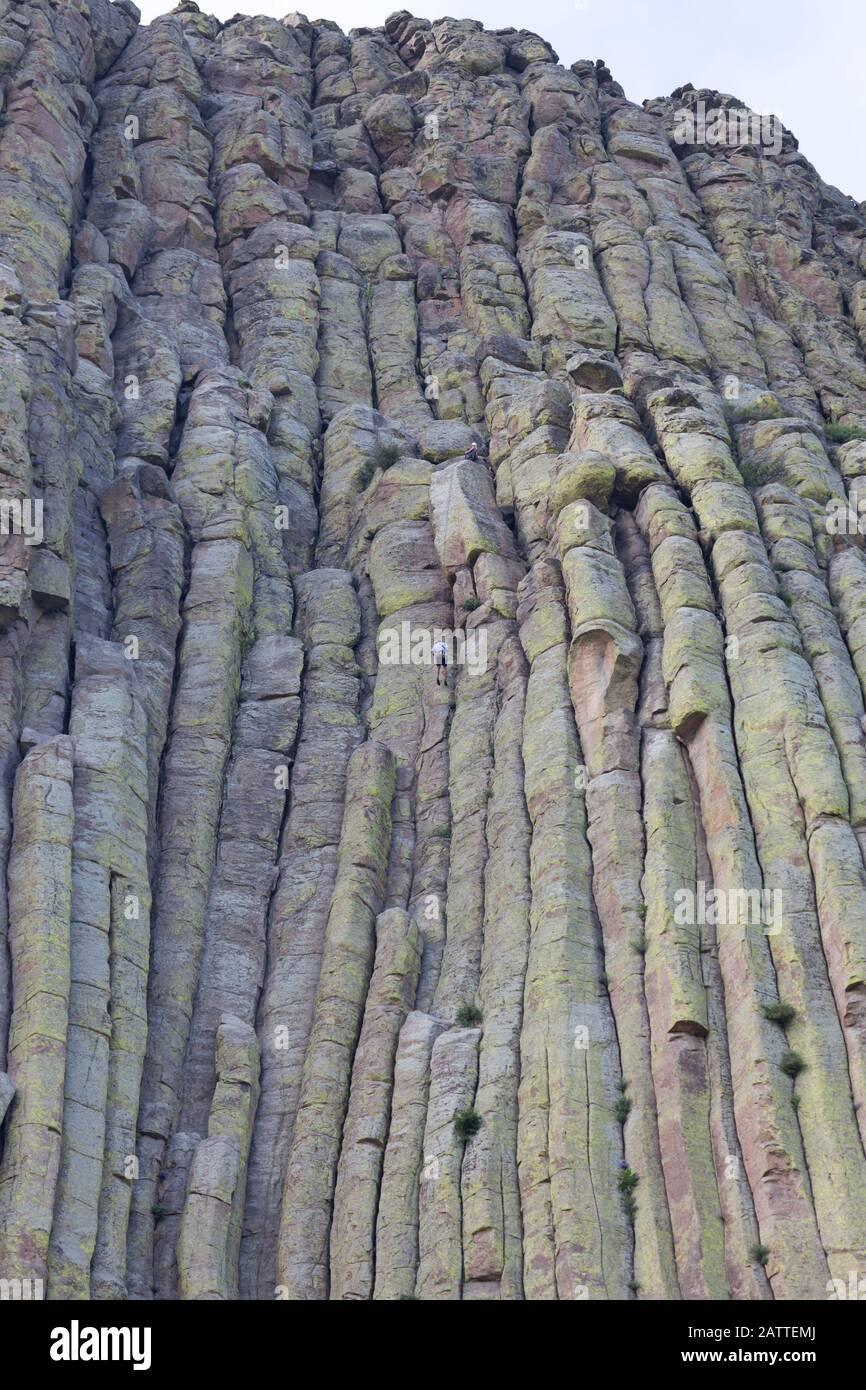 Unidentifiable people use rope and gear to climb the spectacular ...