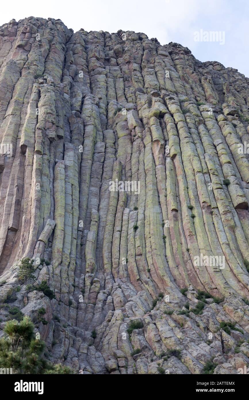 Unidentifiable people use rope and gear to climb the spectacular ...