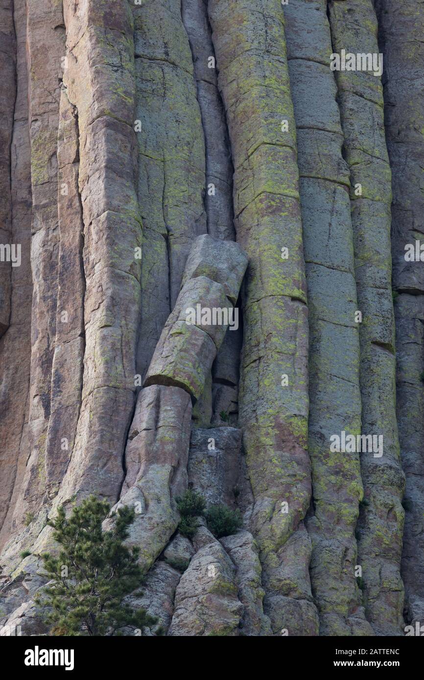 A large column of rock has cracked and fell sideways and is now being ...