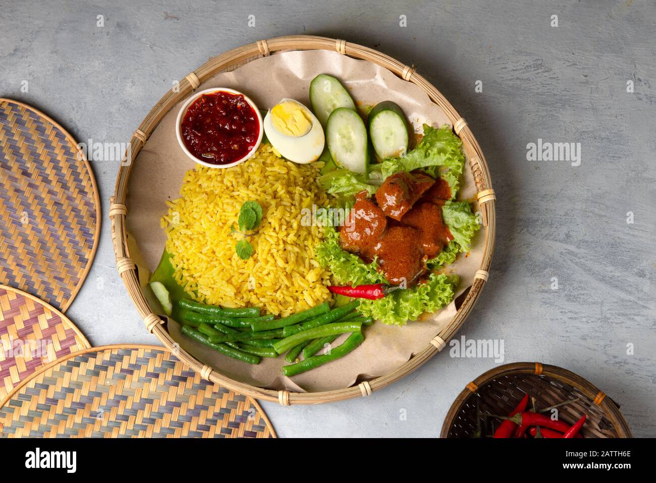 Turmeric rice with curry or nasi kunyit kuning, popular dish in ...