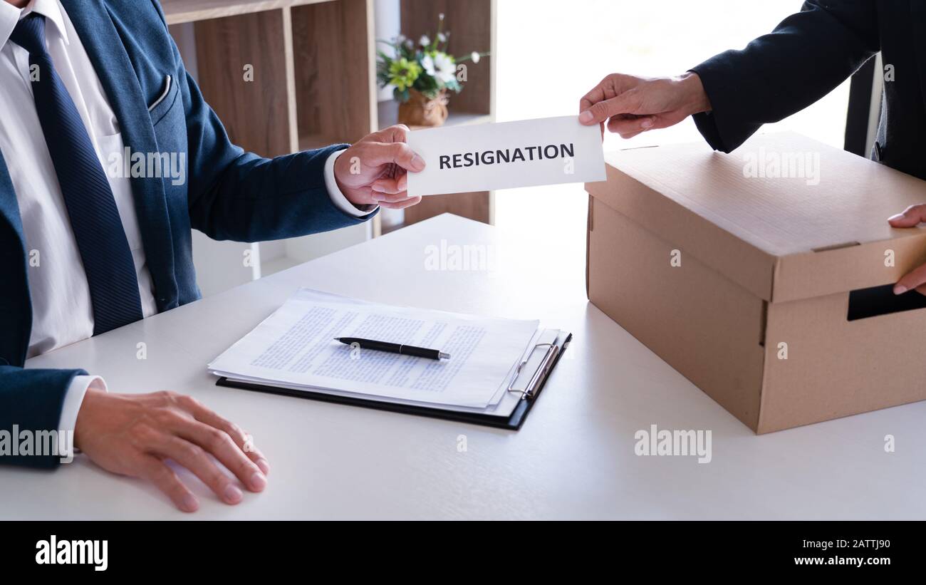 Employee businessman submit or sending resignation document letter to ...