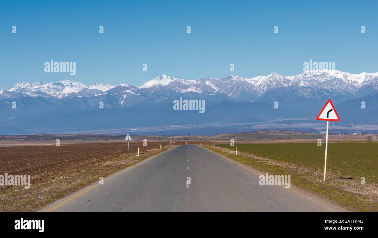 Traffic sign turn right on a country road Stock Photo - Alamy