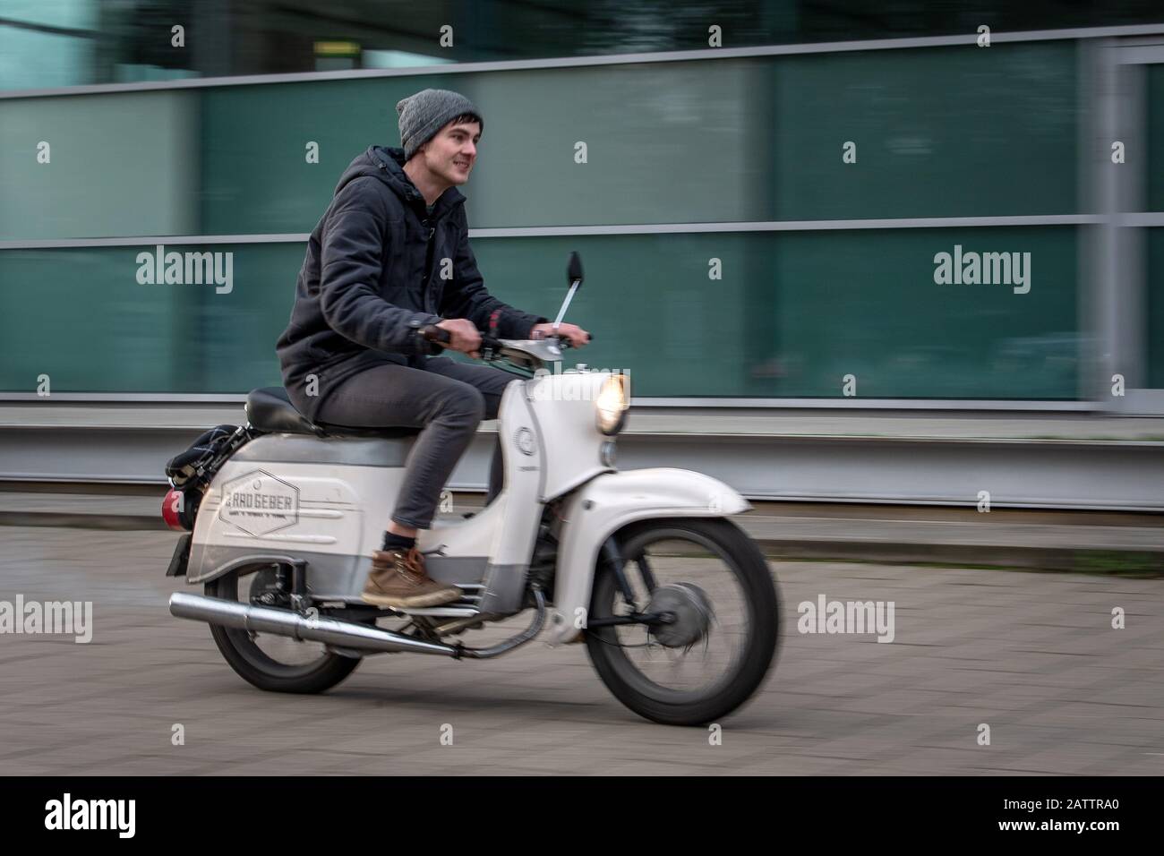 Bremen, Germany. 30th Jan, 2020. Martin Klein rides his Schwalbe, a ...