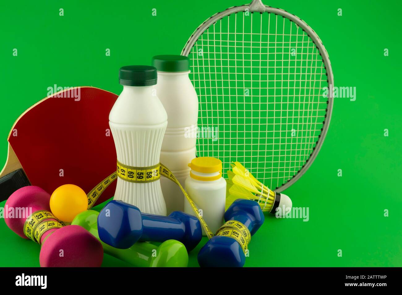 Table tennis, badminton sports and healthy nutrition concept still life ...