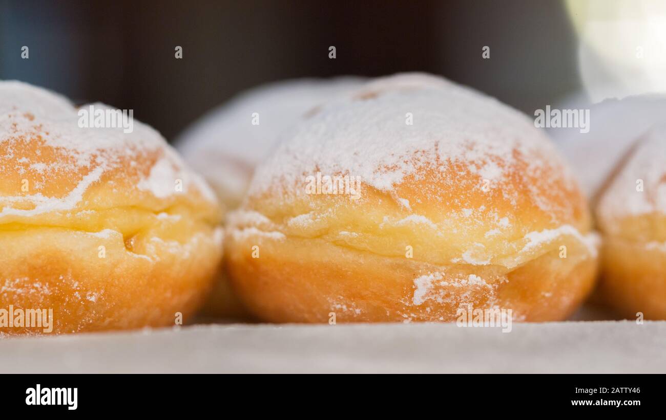 Side view (close up) of an austrian Krapfen. In northern parts of ...