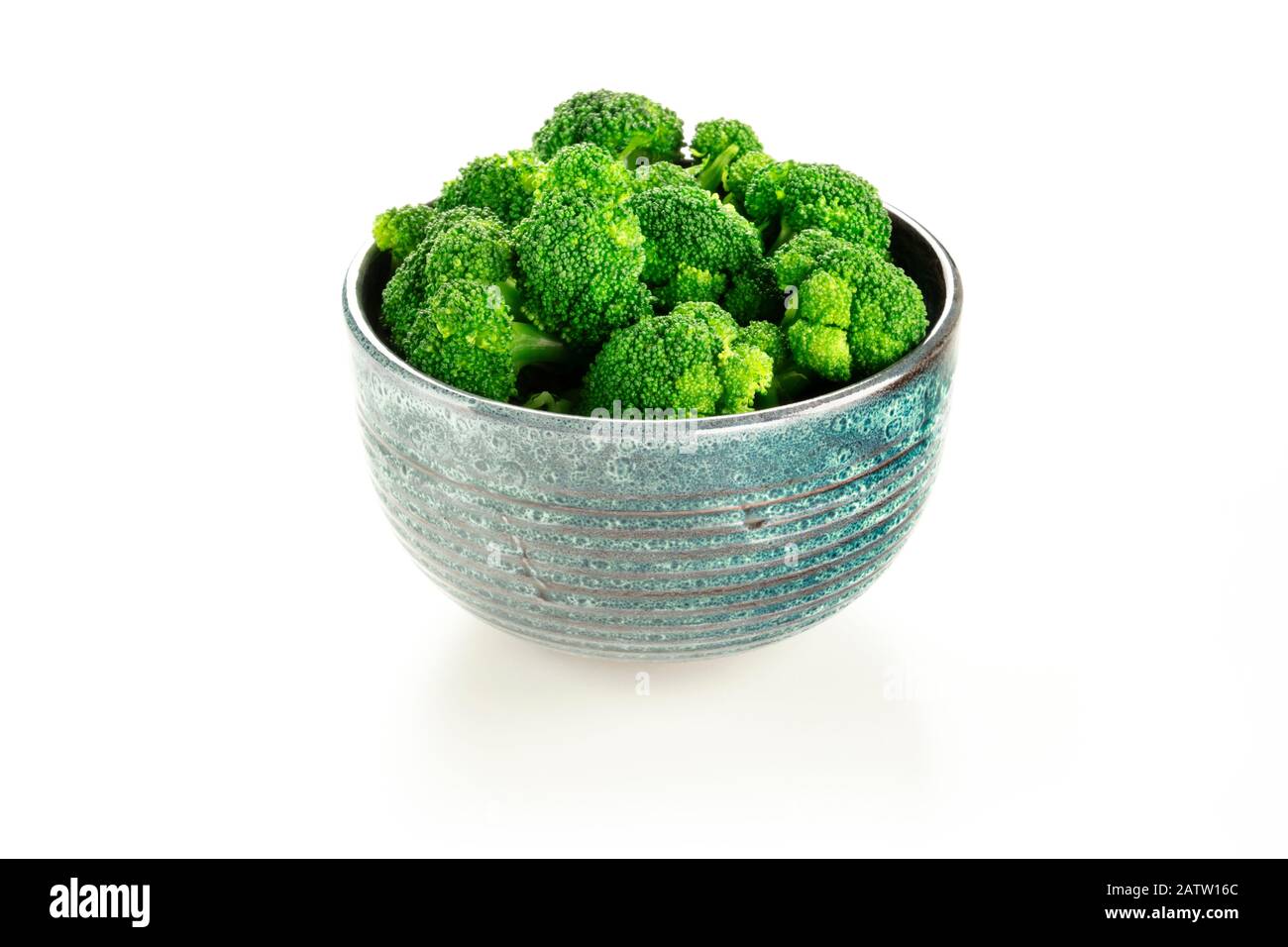 Steamed broccoli, white background Cut Out Stock Images & Pictures - Alamy