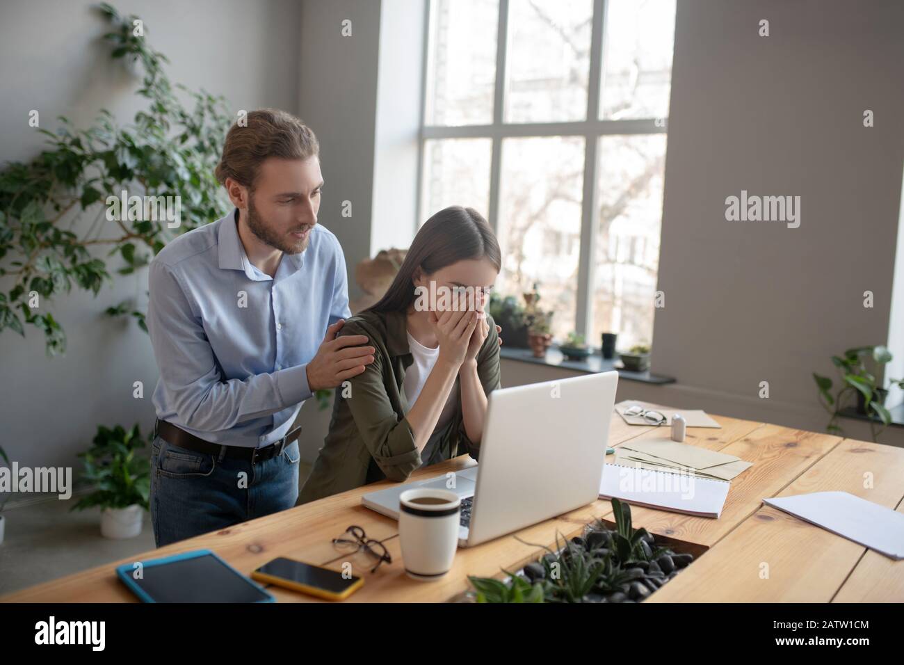 Supporting a colleague hi-res stock photography and images - Alamy