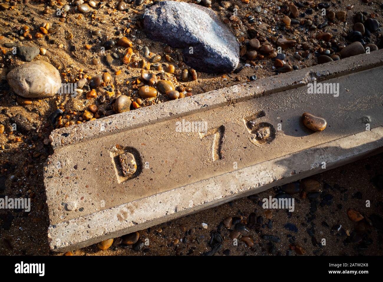 Concrete building materials washed up on beach hi-res stock photography ...