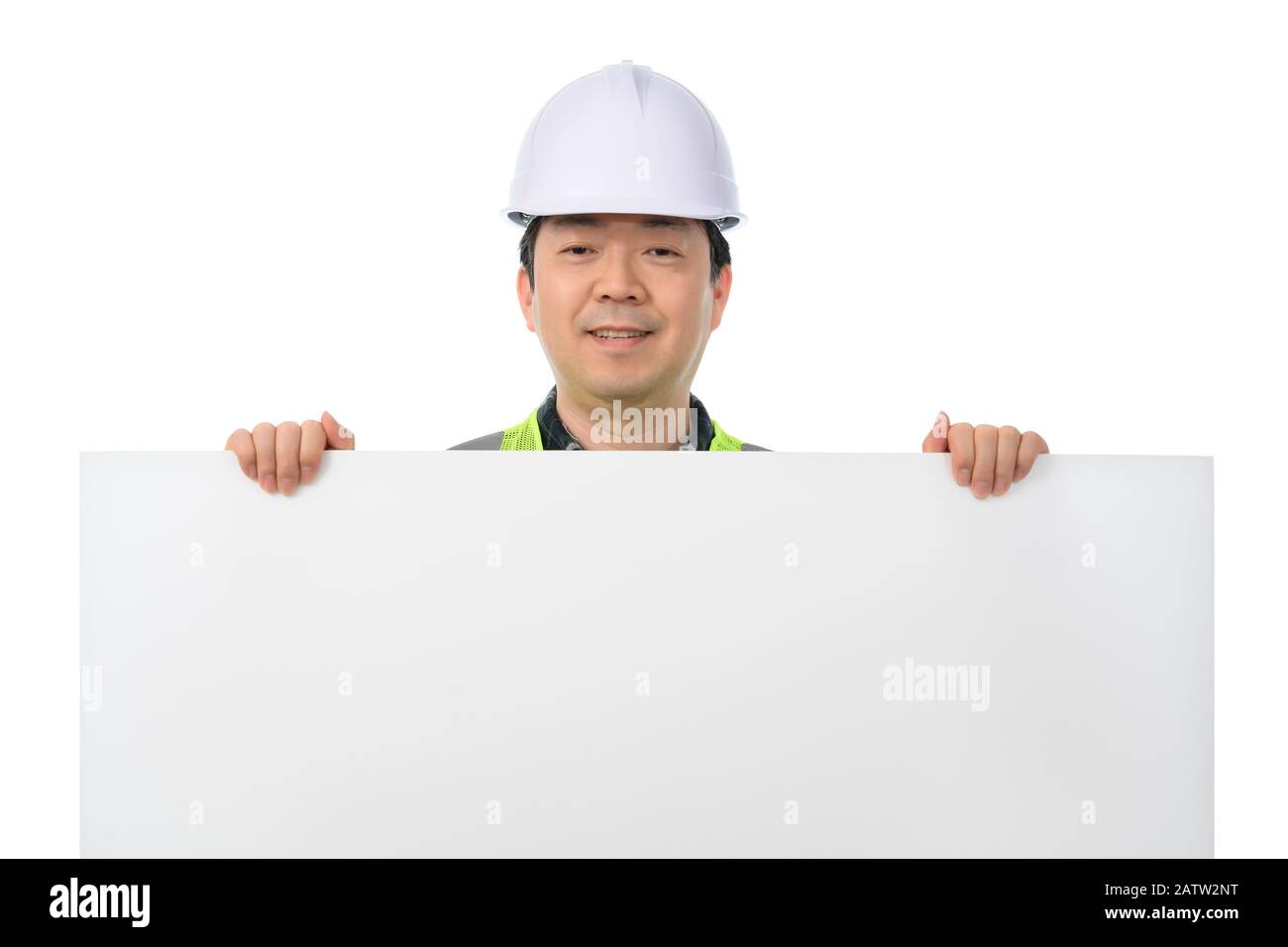 An Asian engineer holding a blank message board Stock Photo - Alamy