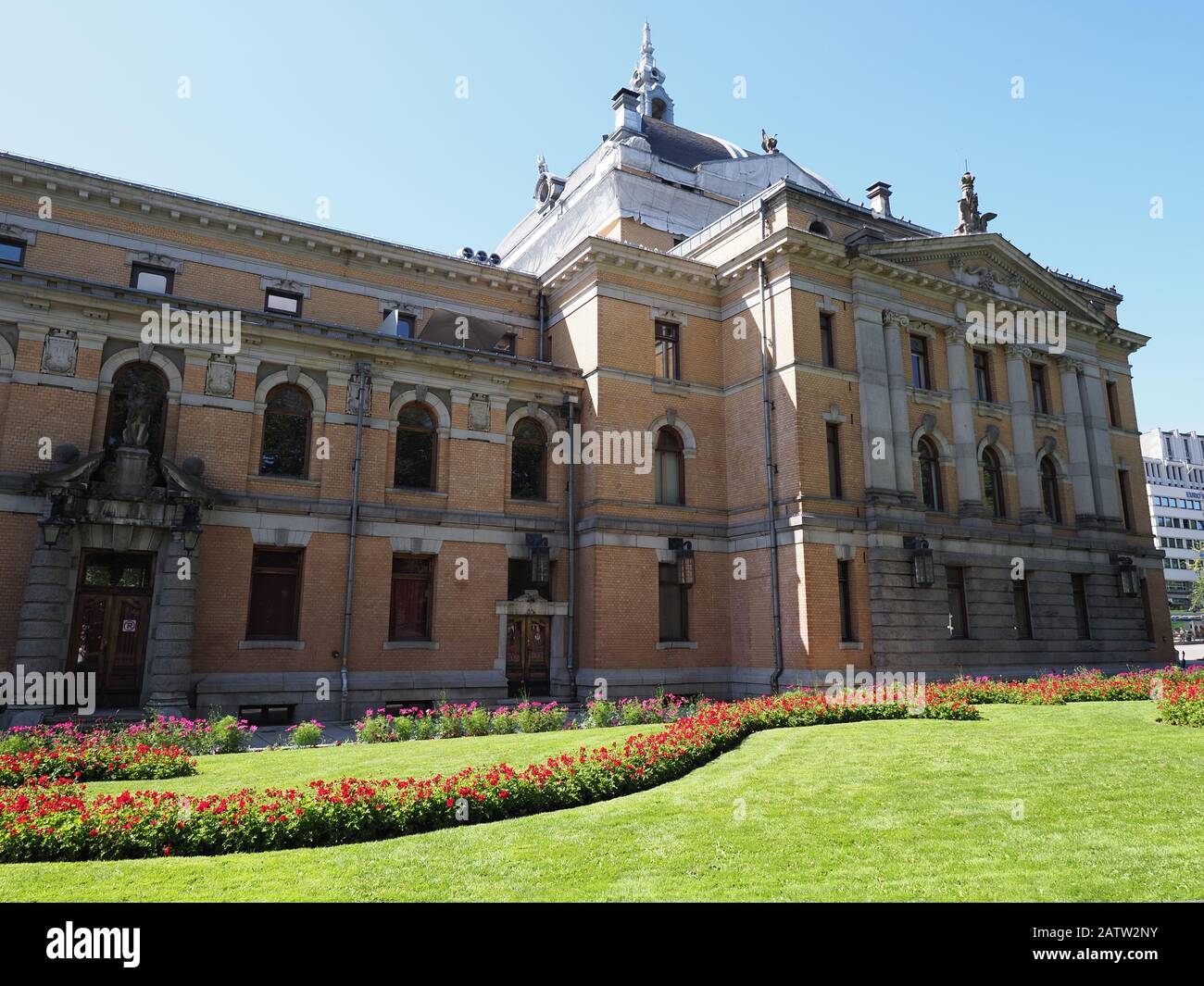Colorful flowers in the garden next to national theatre in european ...