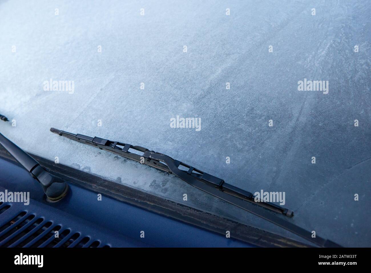 a frozen car windshield Stock Photo - Alamy