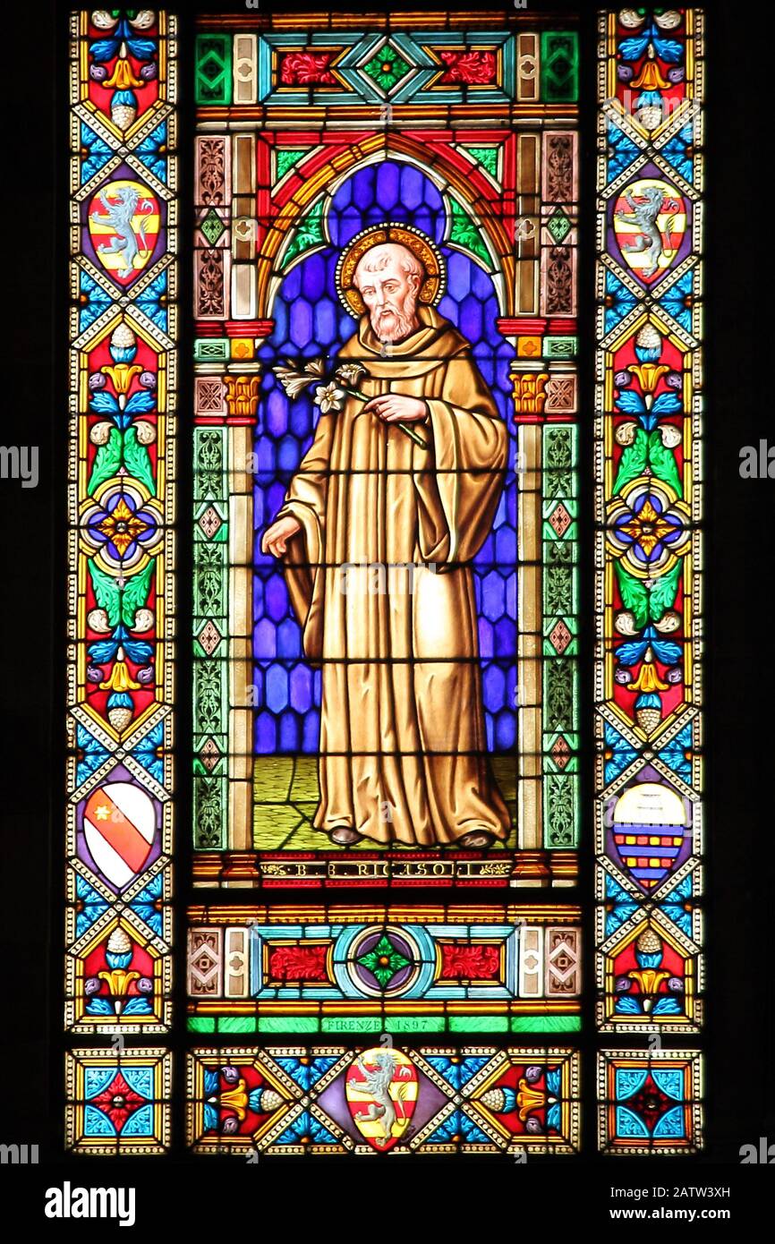 Stained glass window with a Saint Stock Photo - Alamy