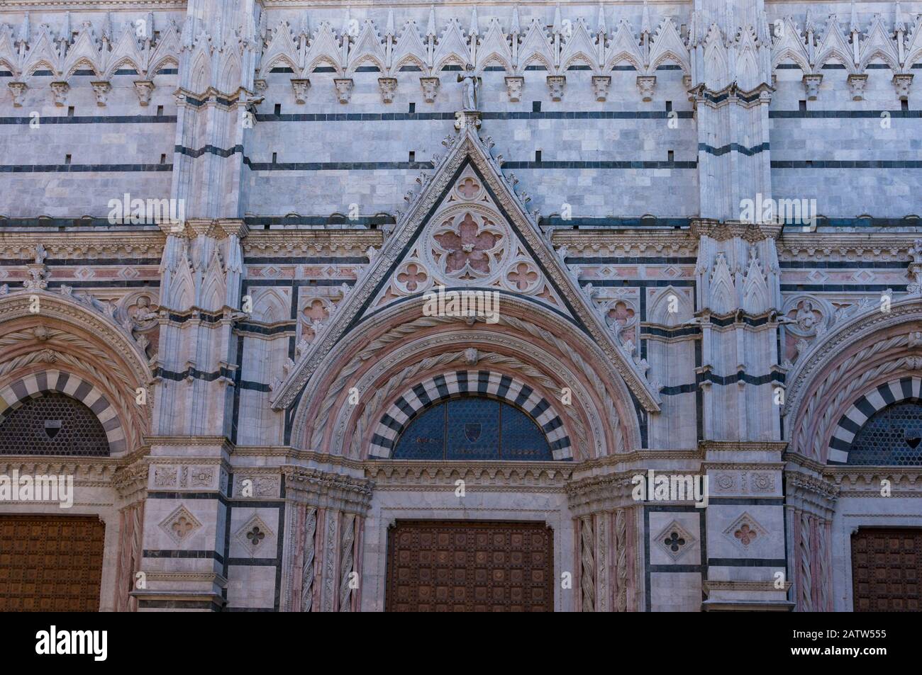 Siena Cathedral facade with ornate walls and windows, Italian historic ...