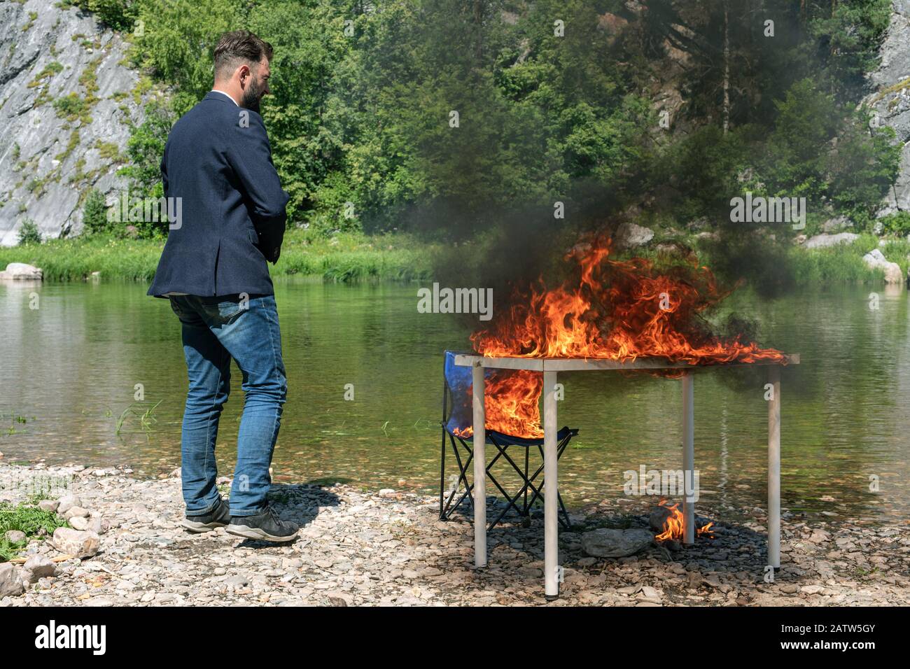 laptop short circuit. Concept of fire safety violation rule or careless ...