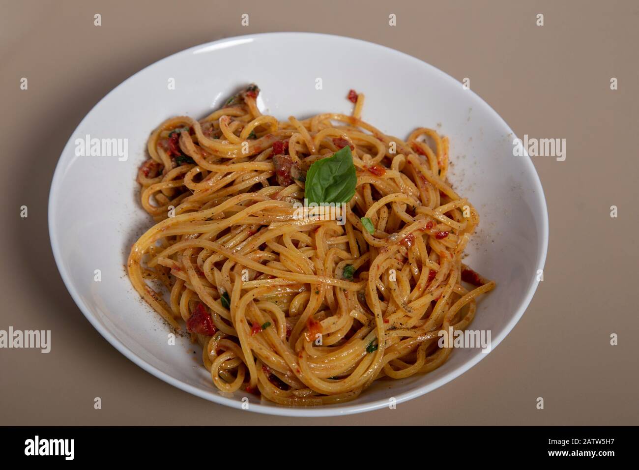 Classic italian spaghetti pasta with tomato sauce, cheese parmesan and ...