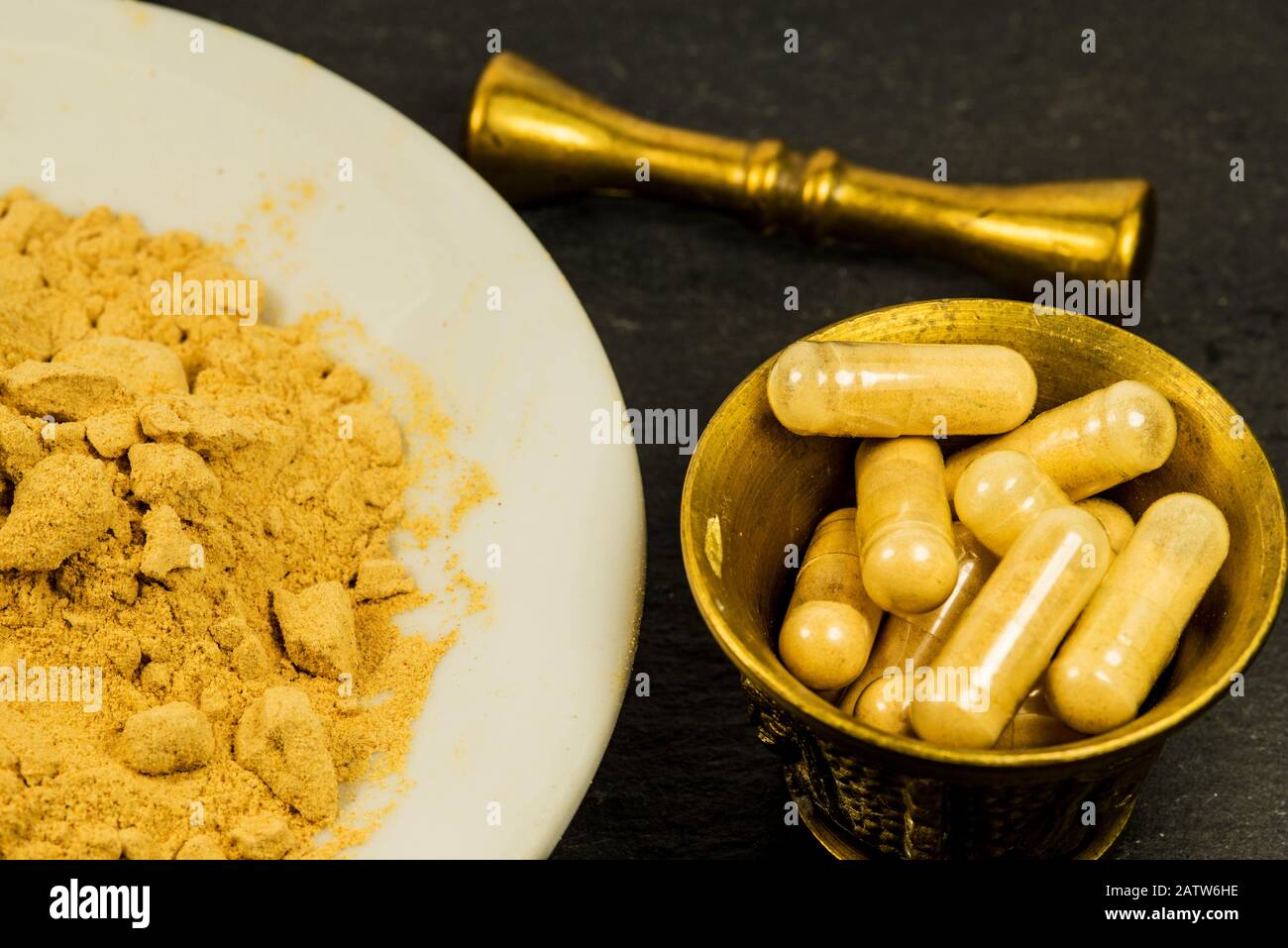 Maca, powder and capsules in a closeup Stock Photo - Alamy