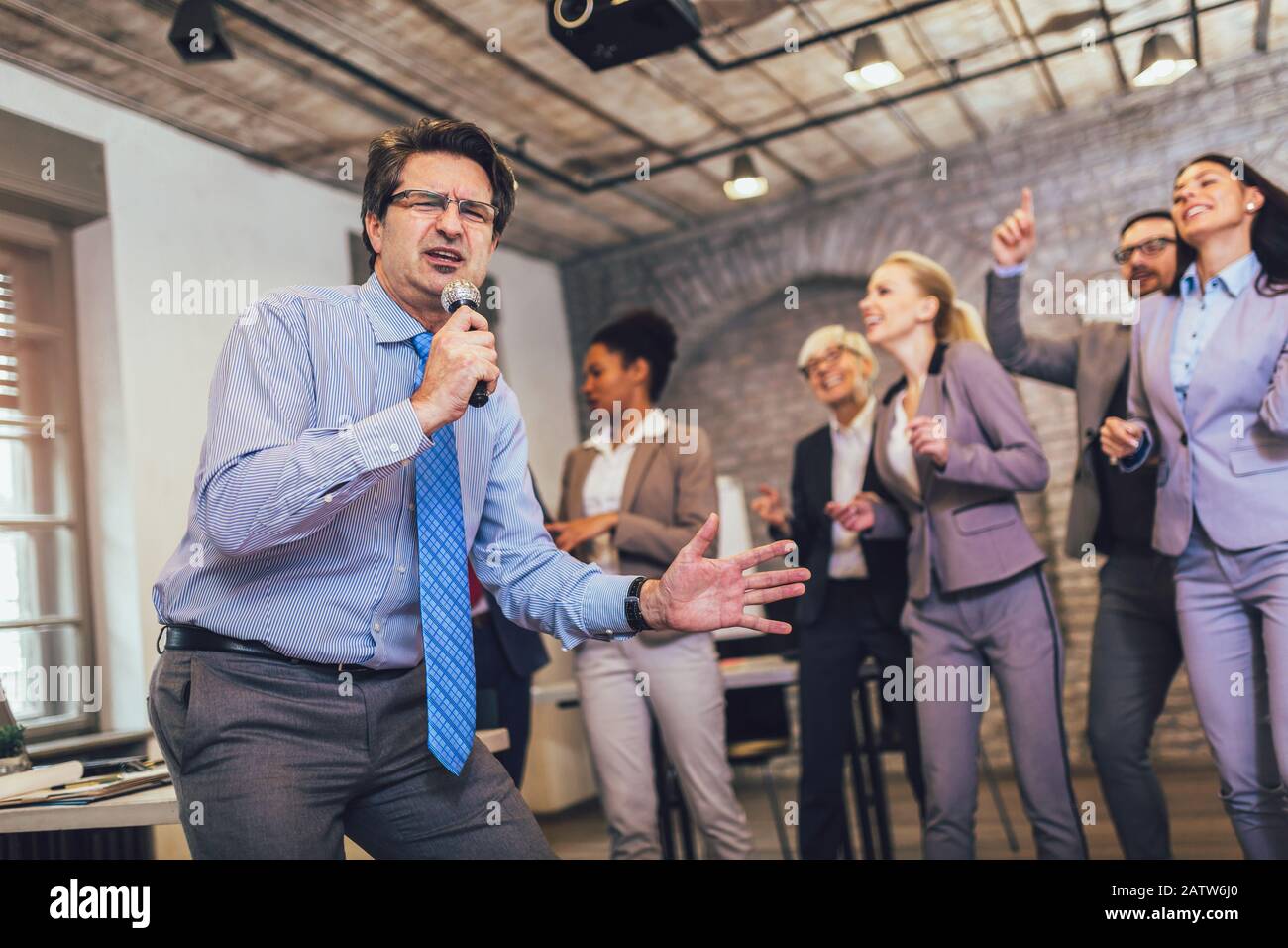 Funny teambuilding activity. Business people making team training ...